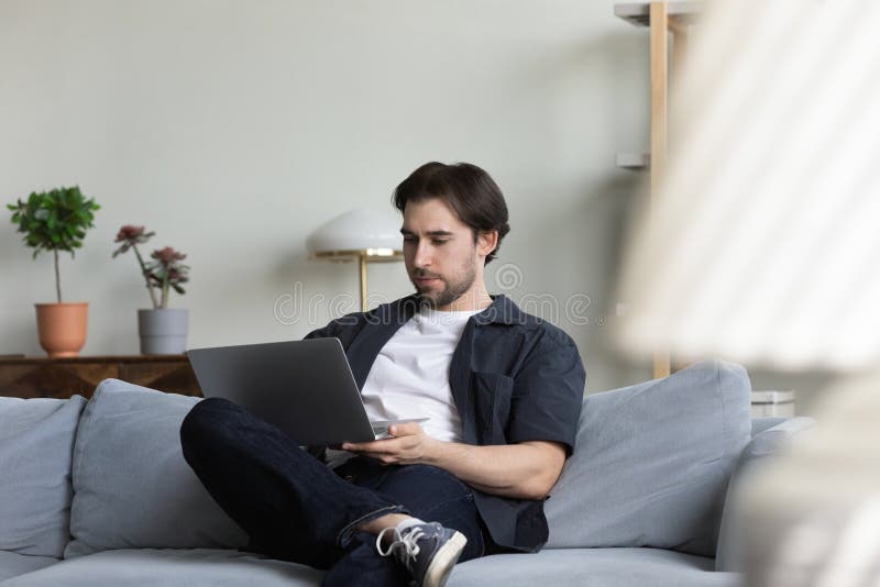 Happy Millennial 30s Man Using Computer at Home. Stock Image - Image of ...