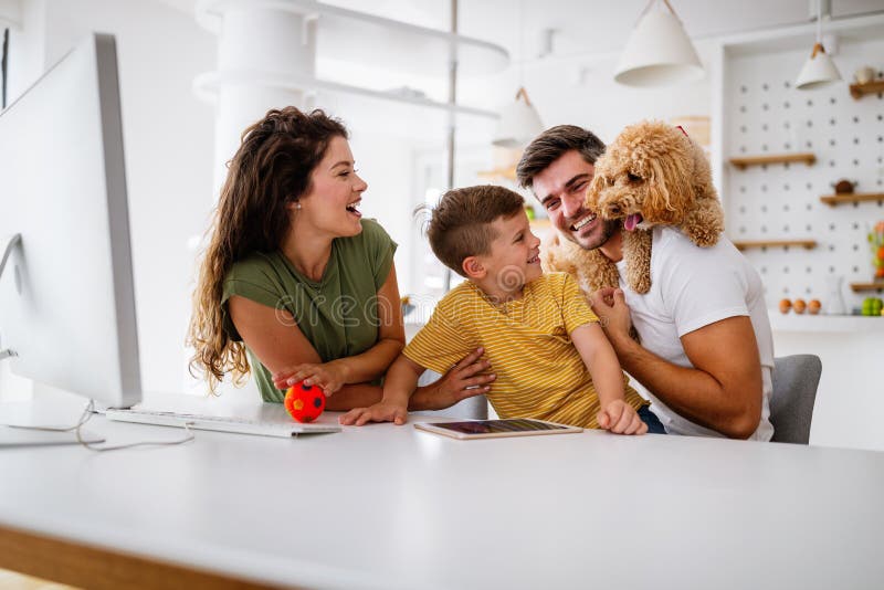 Happy Modern Family Using Computer Together at Home Stock Photo - Image ...
