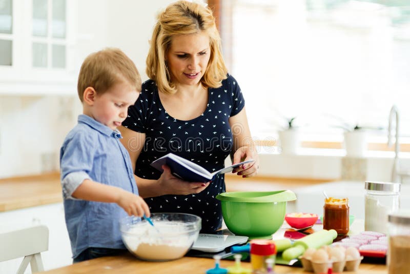 Happy Mother and Children in the Kitchen. Healthy Food, Family, Cooking ...