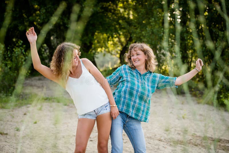 Happy Mother and Daughter Dancing Stock Image - Image of love, dancing ...