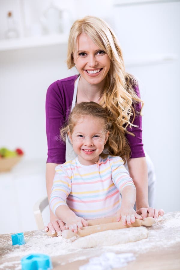 Happy Mother and Daughter Making Bread Stock Photo - Image of diet ...