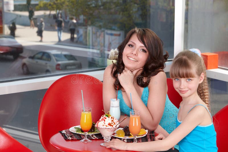 Happy Mother and Daughter in Restaurant. Stock Photo - Image of family ...