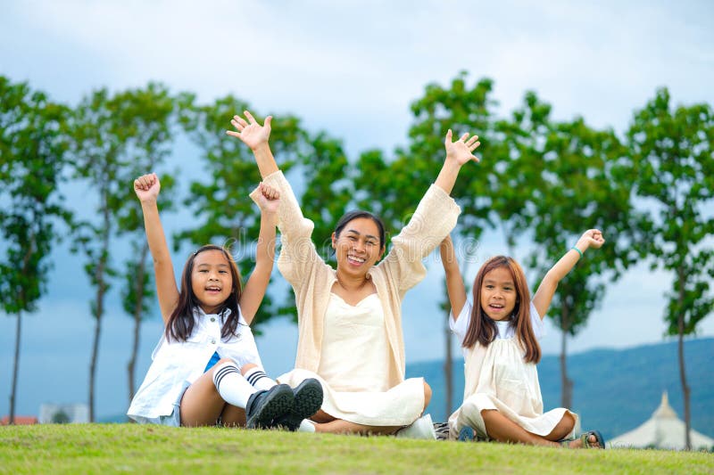 Happy Mother and Daughter Spending Time Together in a Park during ...