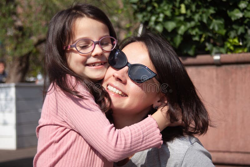 Happy Mother And Daughter In Sunglasses Having Fun On A Summer Day