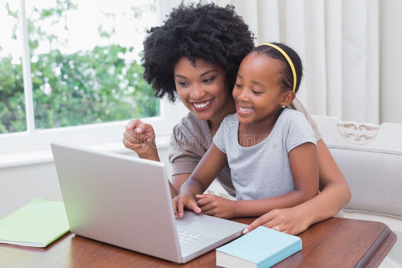 Happy Mother and Daughter Using the Laptop Stock Photo - Image of abode ...