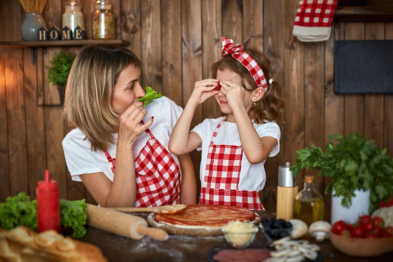 Mother And Daughter Cooking Pizza And Have Fun Stock Image Image Of
