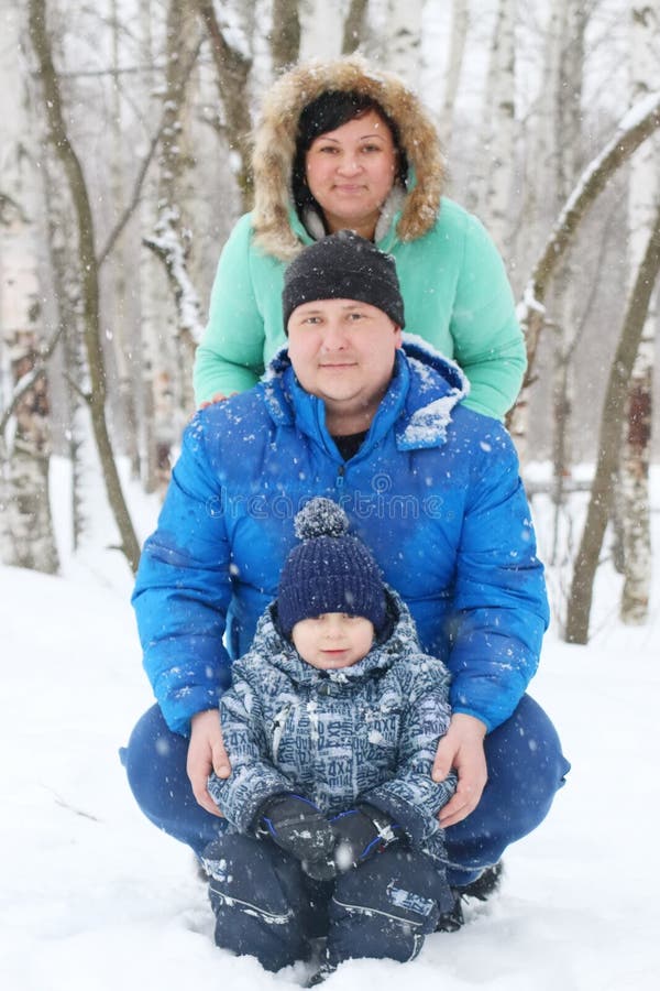 Happy Family (father, Mother, Two Sons) Pose with Snowracer Stock Photo ...