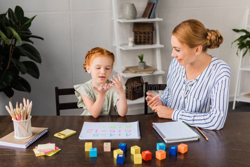 Mother and Daughter Learning Math at Home Stock Image - Image of ...