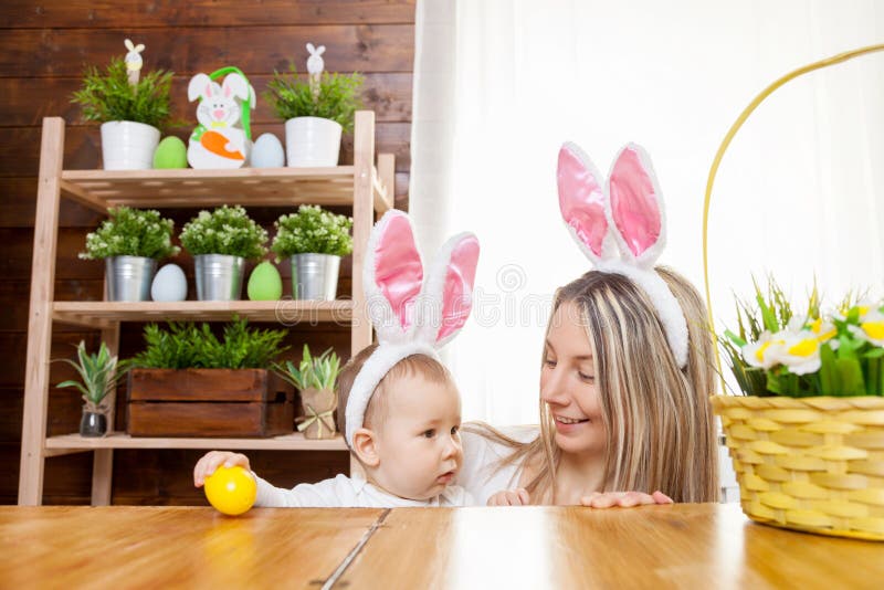 Happy Mother and Her Cute Child Wearing Bunny Ears, Getting Ready for ...