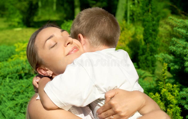 Happy Mother and Son with Flowers Stock Photo - Image of happiness ...