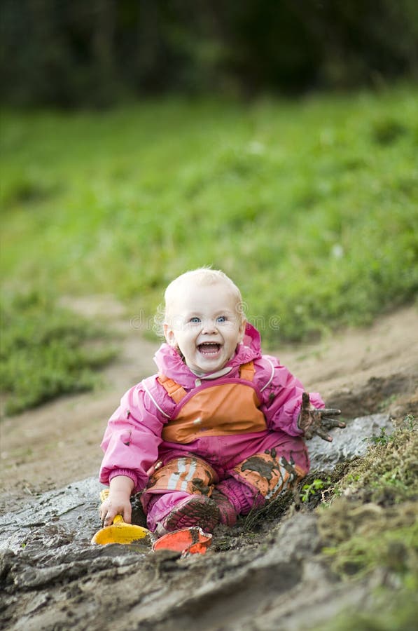 Happy Muddy Child stock image. Image of children, girls - 12907651
