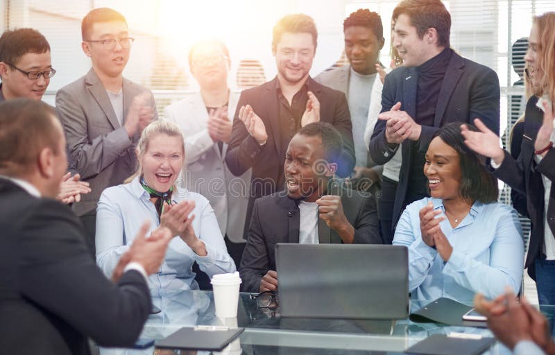 Happy Multi-ethnic Business People Around a Conference Table Stock ...