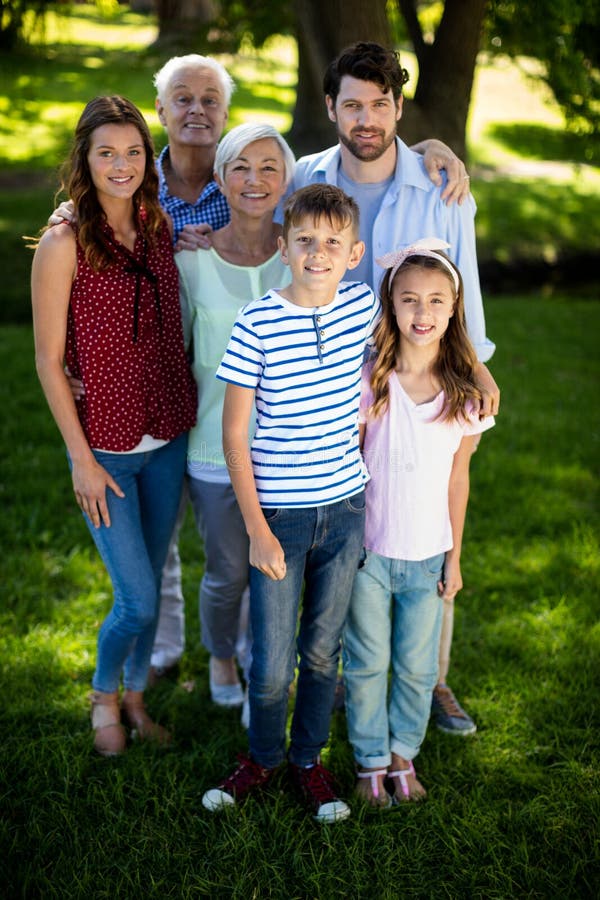 Happy Multi Generation Family Standing in Park Stock Image - Image of ...