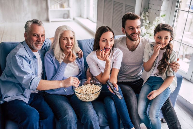 The Happy Multi Generation Family Watching a Tv. Stock Image - Image of ...