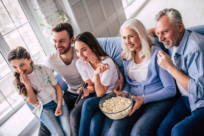The Happy Multi Generation Family Watching a Tv. Stock Image - Image of ...