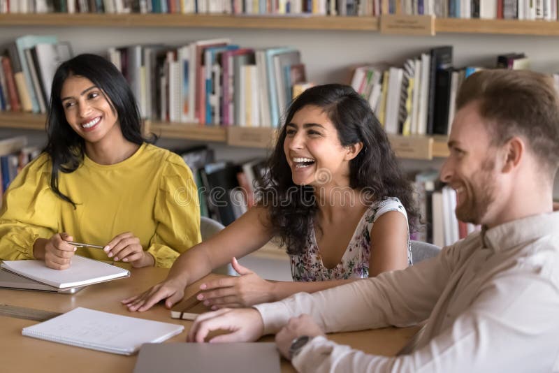 Happy Multicultural Students Laughing on Group Learning at Public ...