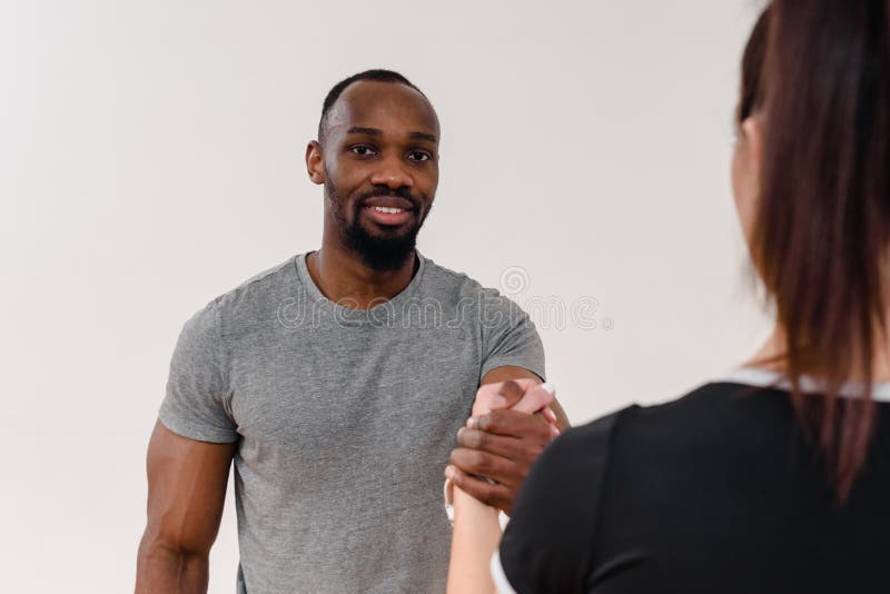 Couple exercising together stock image. Image of hands - 212864801
