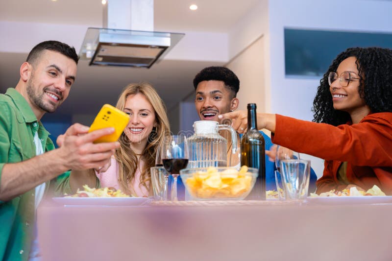 Happy Multiethnic Friends Enjoying Snacks and Drinks in Modern Bright ...