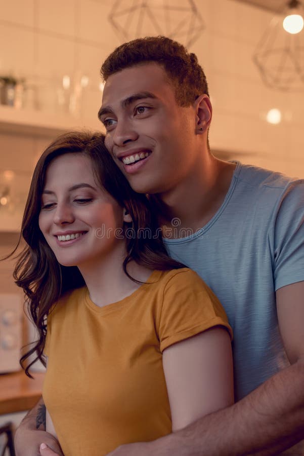 Happy Multiracial Couple Smiling at White Stock Image - Image of ...