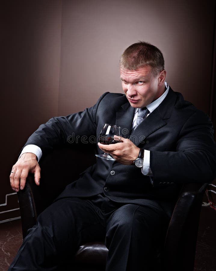 Happy muscular man in suit stock image. Image of adult - 13042757