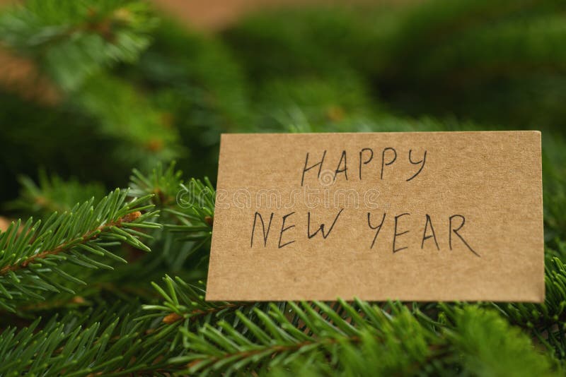 Happy New Year Card on Spruce Twigs Stock Image - Image of green, paper ...