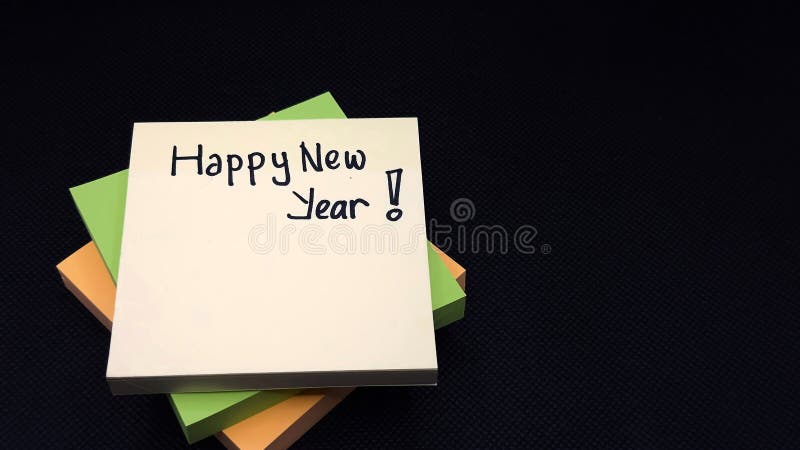 Happy New Year Message Written on the Top Stack of Sticky Notes ...