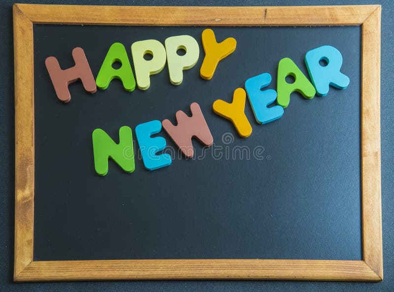 Happy New Year Wooden Word on Black Board Stock Image - Image of ...