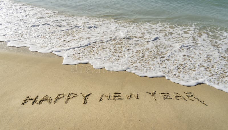 Happy New Year Message on the Sand Stock Image - Image of season, coast ...