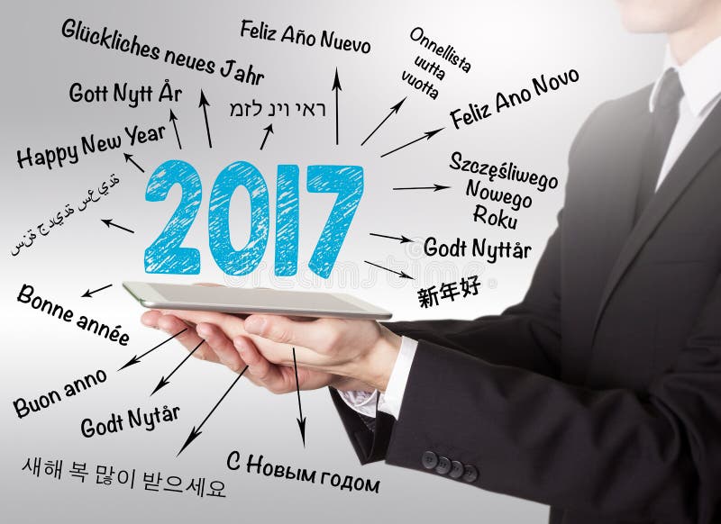 2017 Happy New Year, Young Man Holding a Tablet Computer Stock Image ...