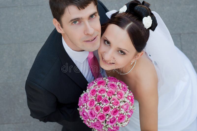 Happy newly-married couple stock image. Image of wedding - 26980693
