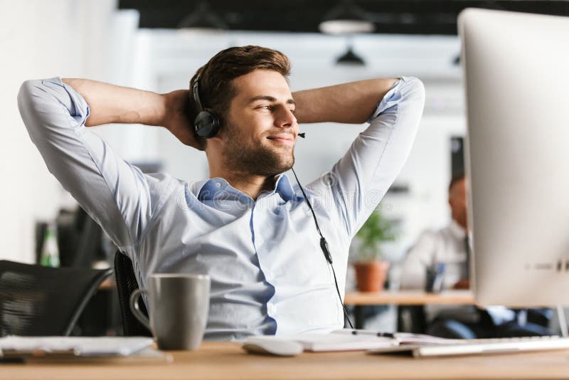 Happy Office Manager Talking by Headset with Microphone Stock Photo ...