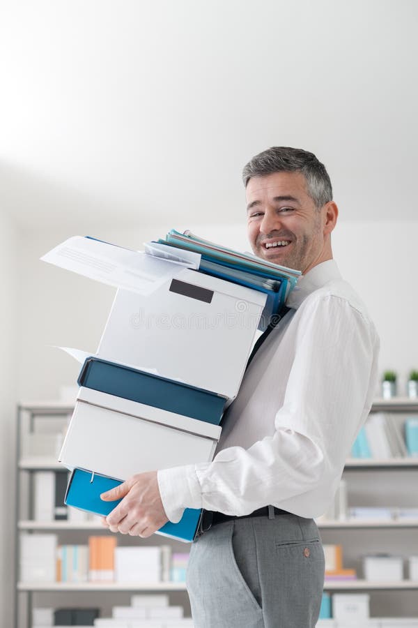 Happy Office Worker Carrying Boxes Stock Photo - Image of overload ...