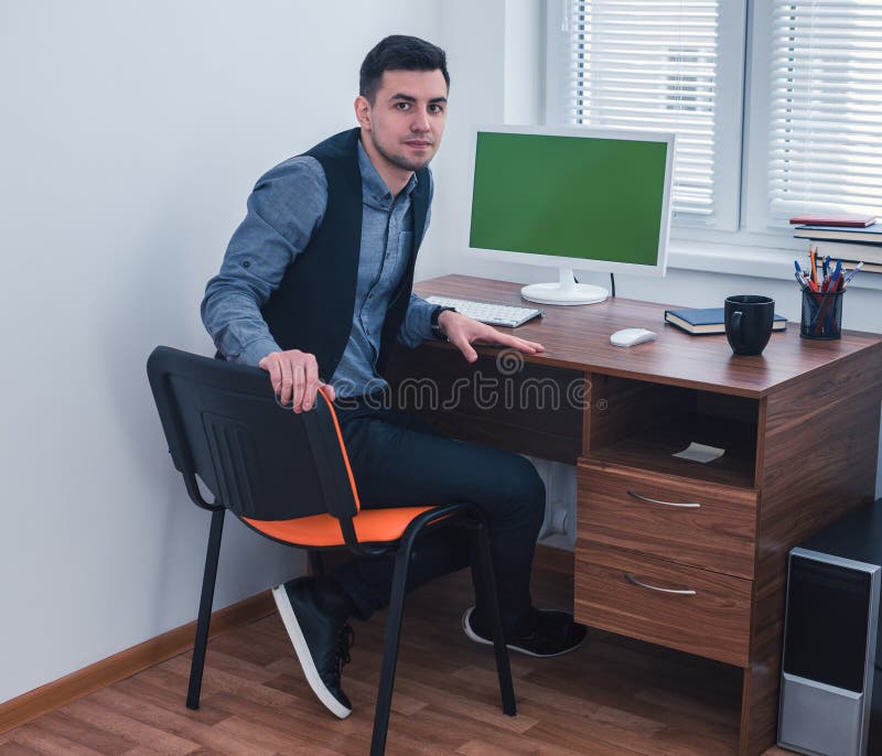 Happy Office Worker Smiling and Looking at the Camera Stock Photo ...