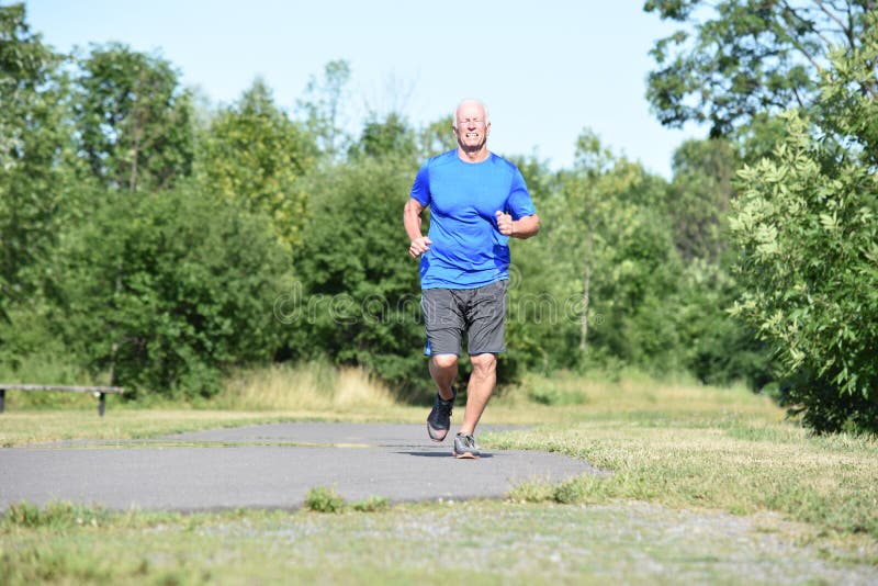 Happy Old Grandpa Jogging stock photo. Image of runner - 144201334