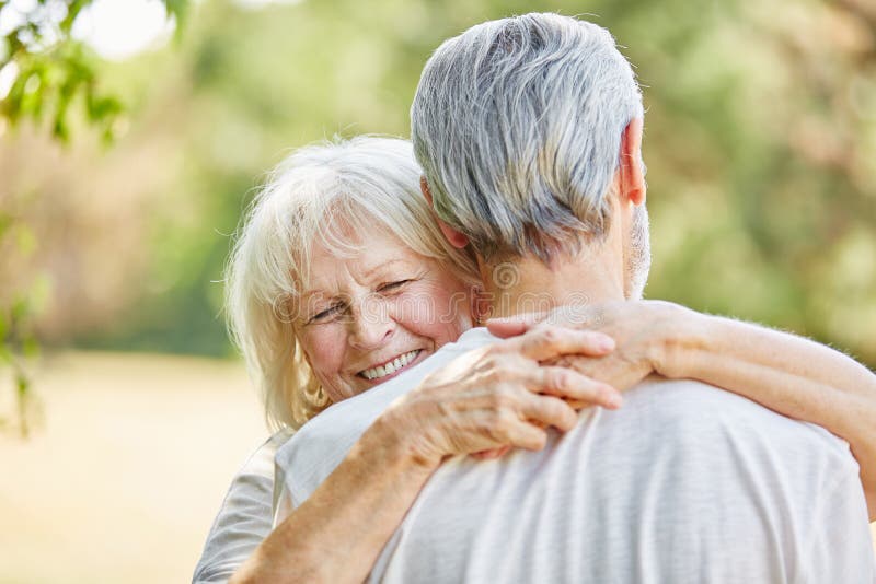 Happy Old Lady Hugging a Man Stock Image - Image of nature, love: 96628521