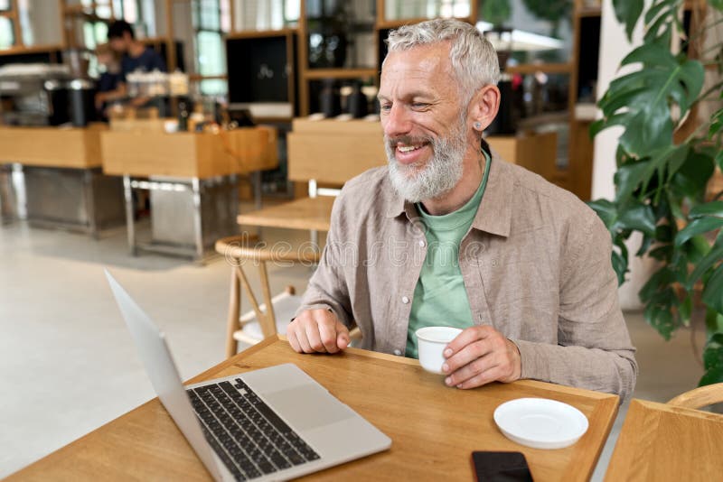 Happy Older Business Man Using Laptop Remote Working or Virtual ...