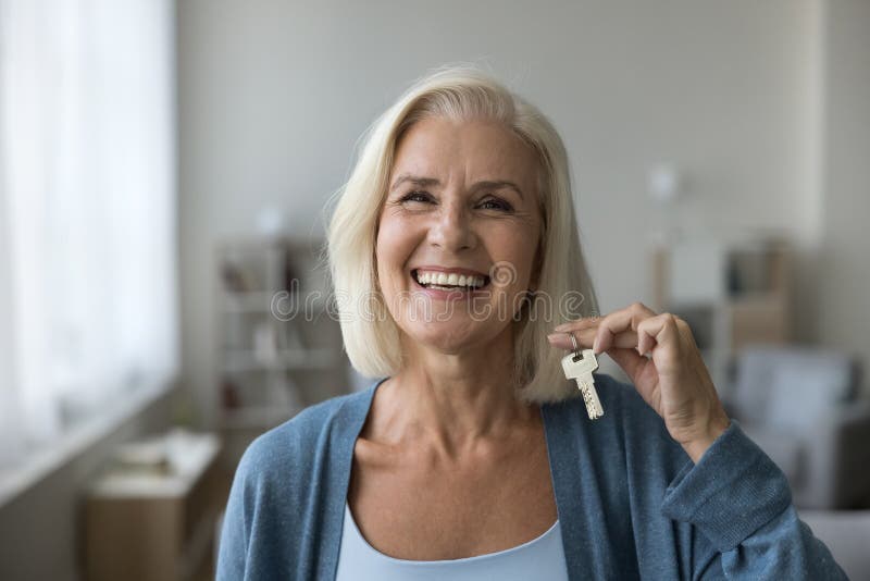 Happy Older Woman Shows Keys From Her New Apartment Stock Image Image
