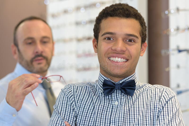 Happy Optician Checking Spectacles Stock Photo - Image of vision ...