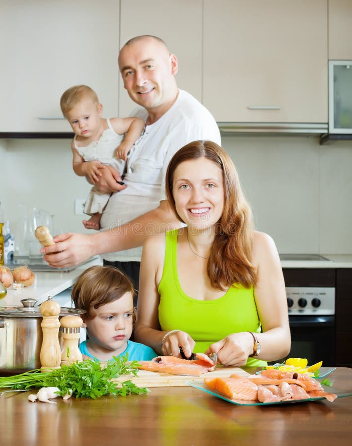 Child Girl Mother Cooking Fish Kitchen Stock Photos - Free & Royalty ...