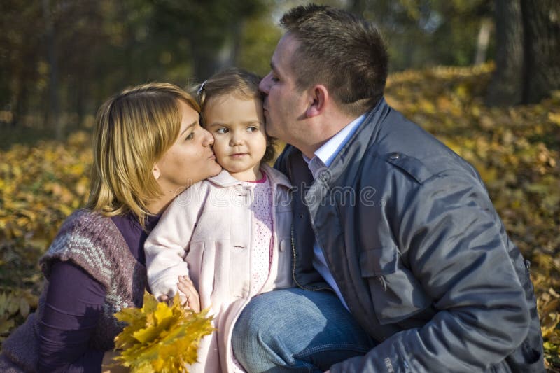 Happy Parents and Little Girl Stock Image - Image of parents, parent ...
