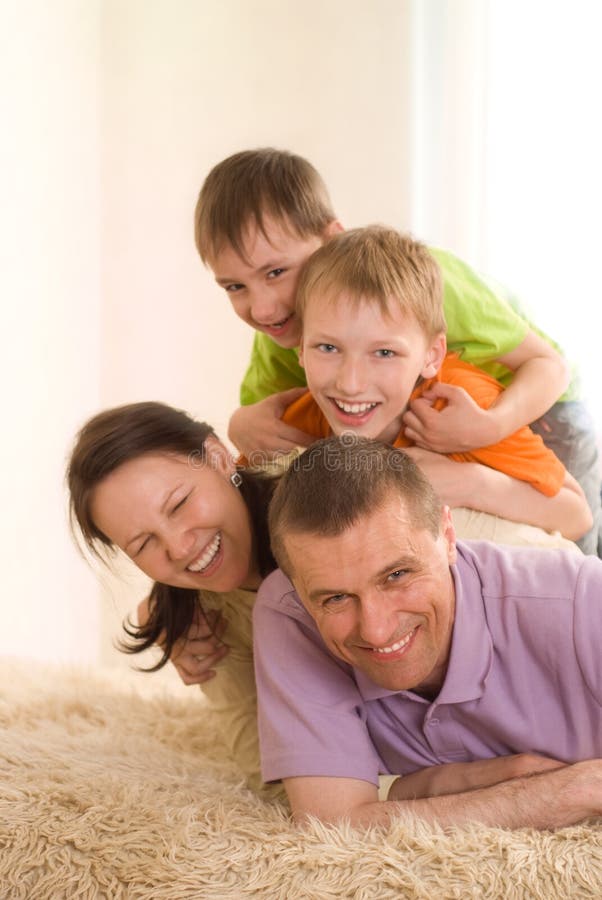 Happy Parents with Their Children Stock Photo - Image of mother ...