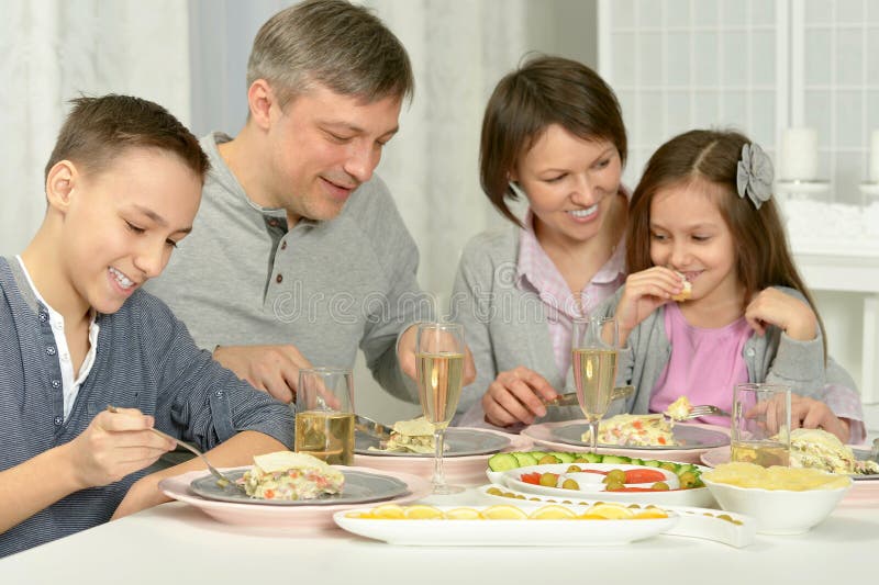 Happy Parents with Their Children Eating Stock Image - Image of love ...