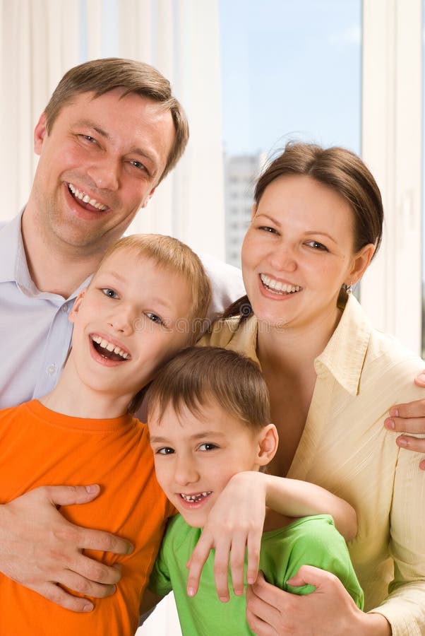 Happy Parents with Two Children Stock Image - Image of people ...