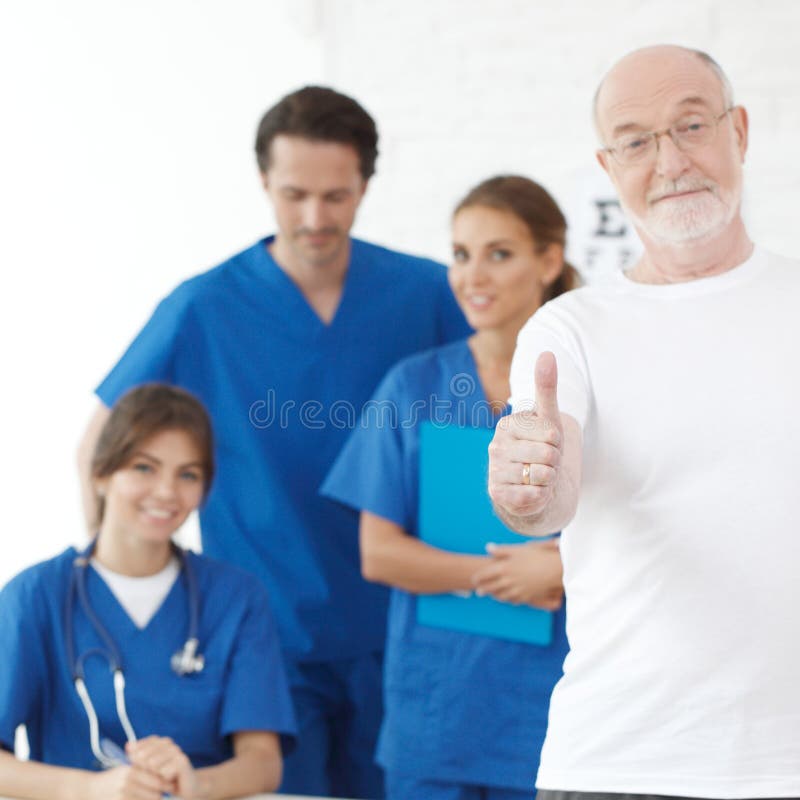 Happy patient and doctors stock photo. Image of care - 138376628