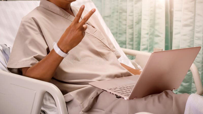 Happy Male Patient Using Laptop Hospital Bed Stock Photos - Free ...
