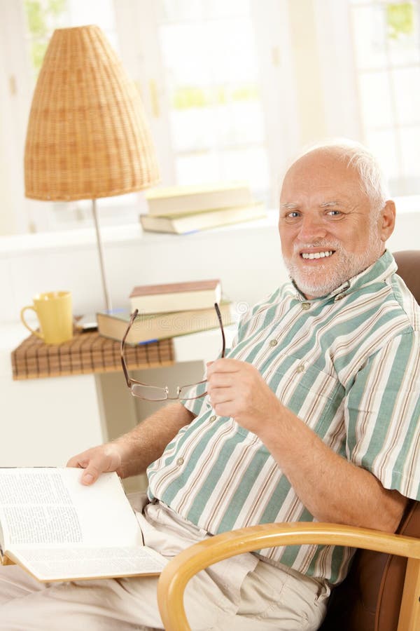 Happy Pensioner Reading at Home Stock Photo - Image of happiness, aged ...
