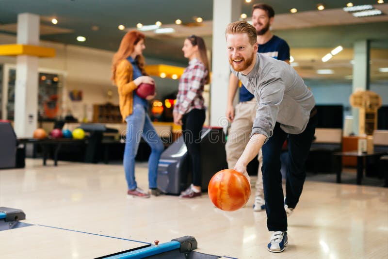 Happy people bowling stock image. Image of casual, friends - 69871679