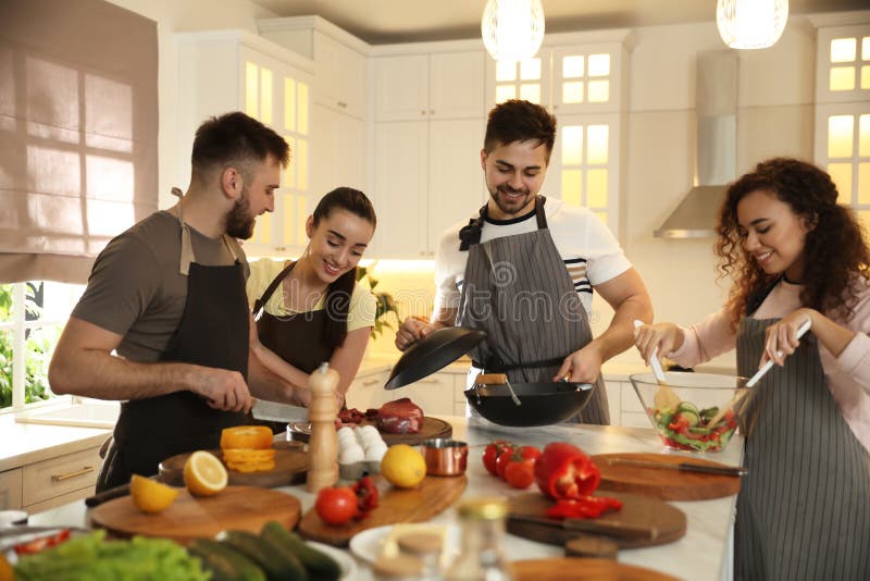 Happy People Cooking Food in Kitchen Stock Photo - Image of healthy ...
