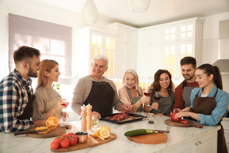 Happy People Cooking Food in Kitchen Stock Image - Image of indoors ...