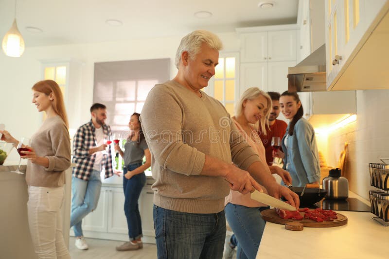 Happy People Cooking Food in Kitchen Stock Photo - Image of dinner ...